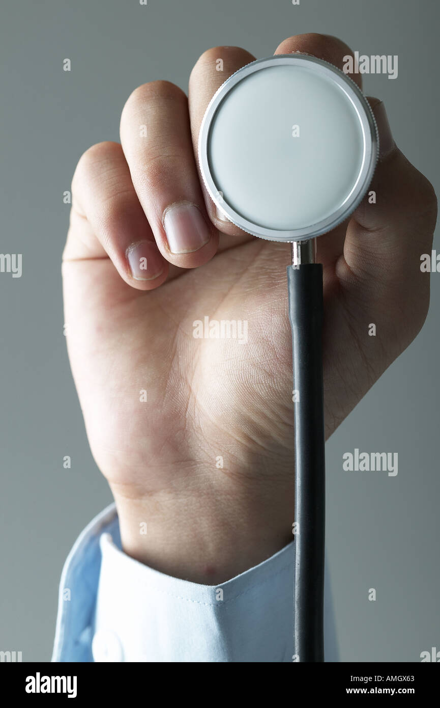 Hands holding stethoscopes hi-res stock photography and images - Alamy