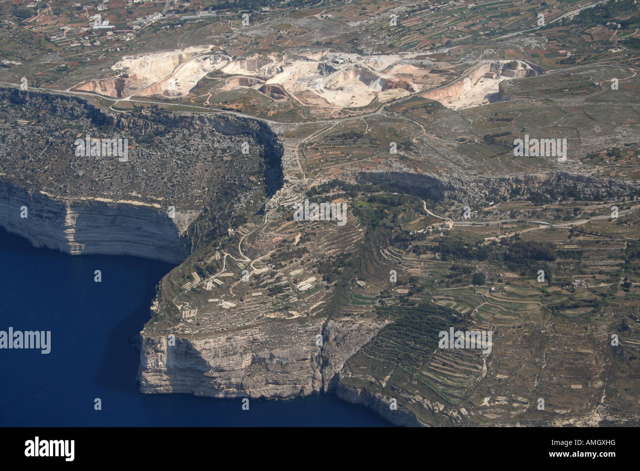 Quarries above the cliffs on the south-west coast of Malta Stock Photo ...