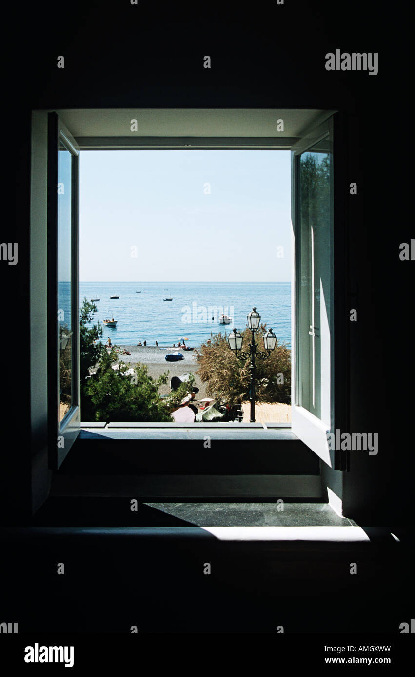 Looking through open window onto beach, Positano, Amalfi Coast ...