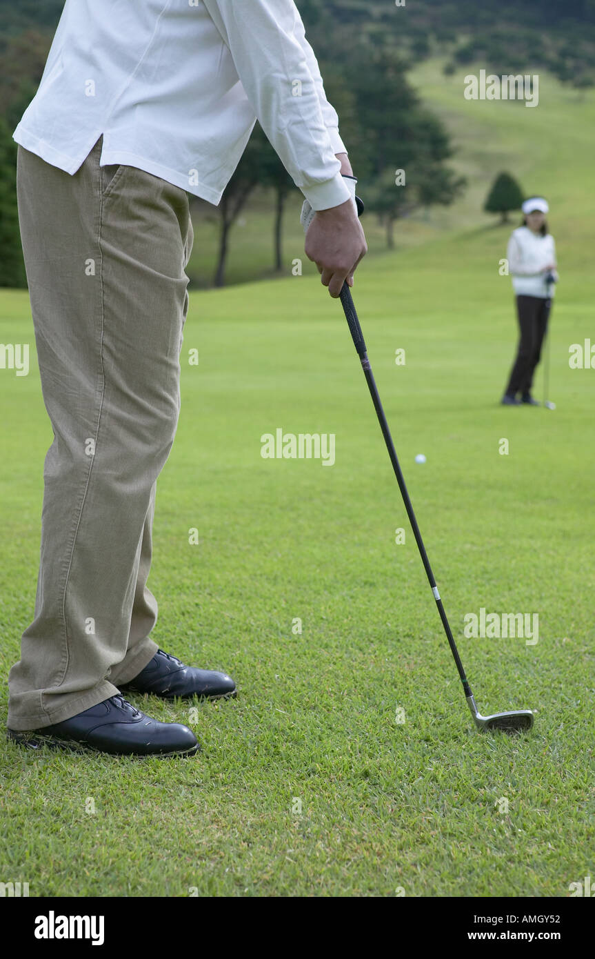 A person playing golf Stock Photo - Alamy