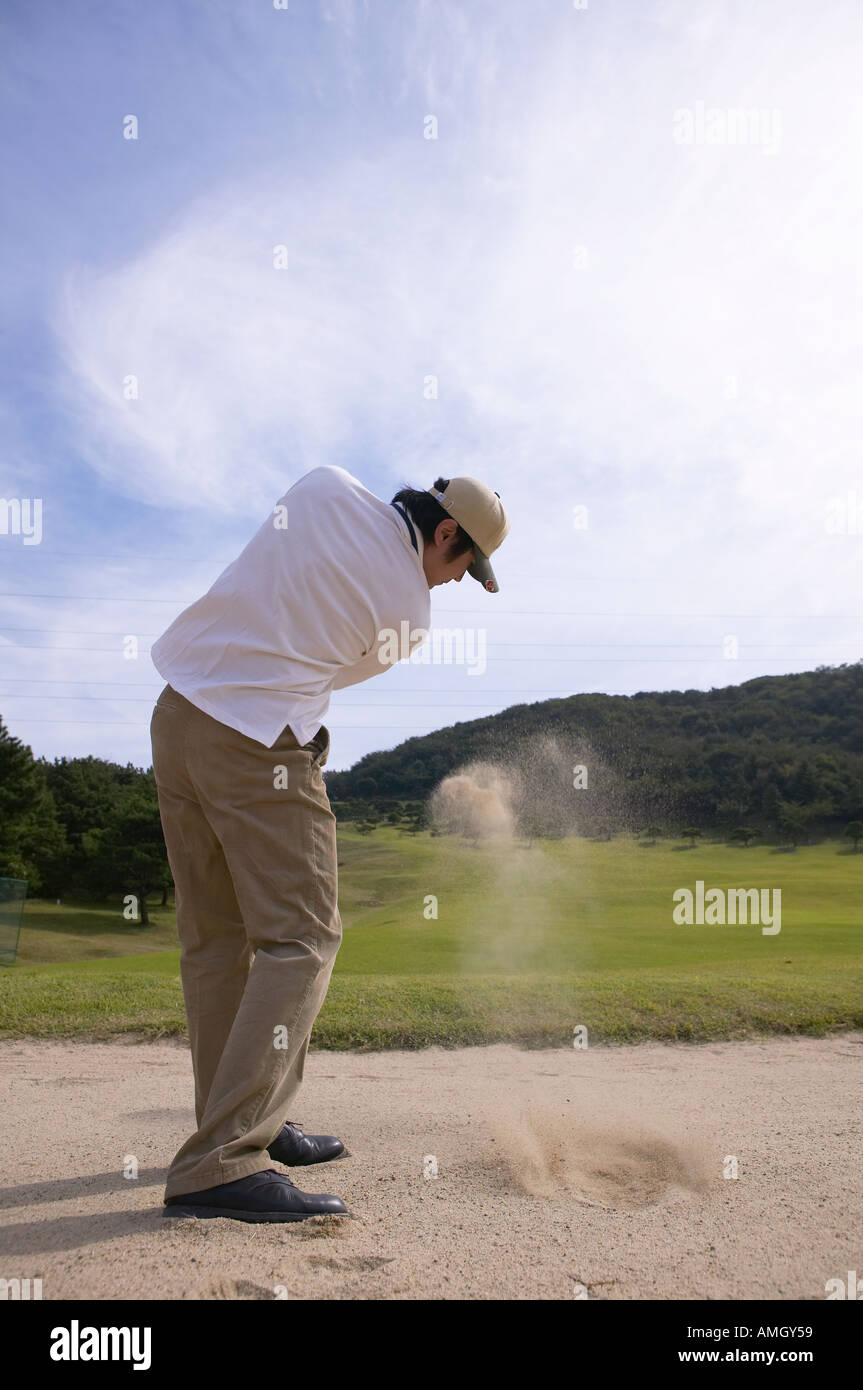 Asian man playing golf hi-res stock photography and images - Alamy