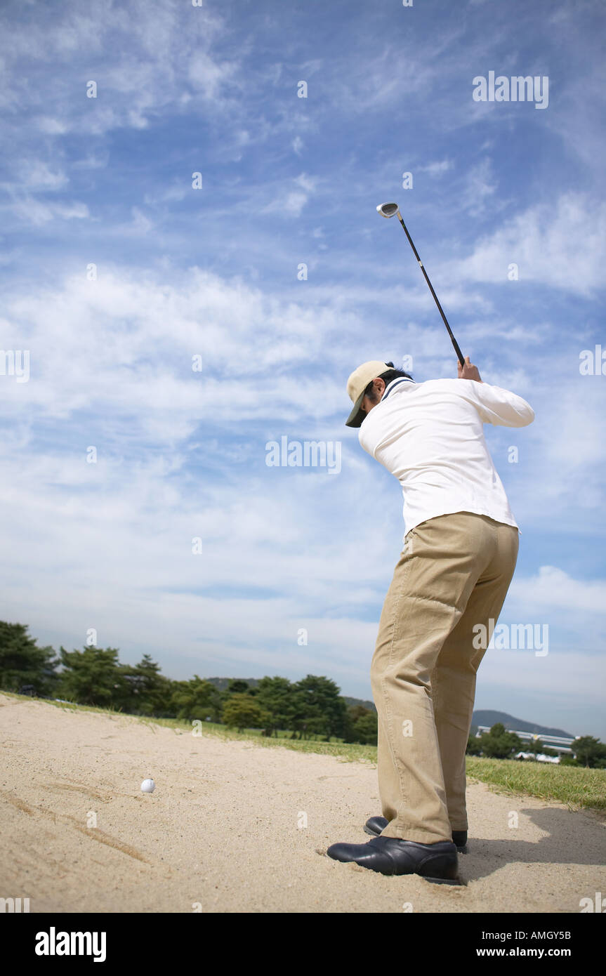 Asian man playing golf hi-res stock photography and images - Alamy