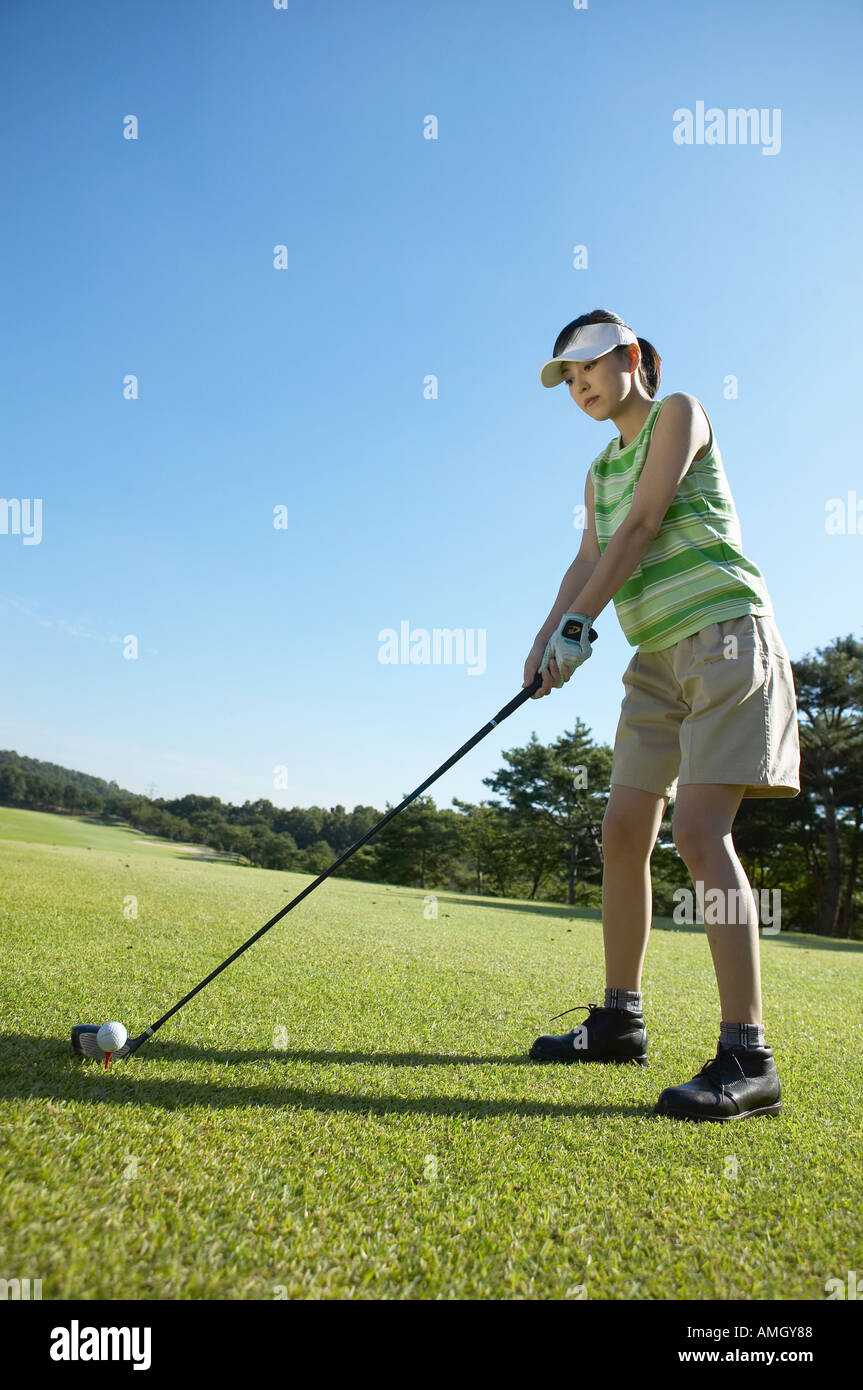 Asian woman playing golf hi-res stock photography and images - Alamy