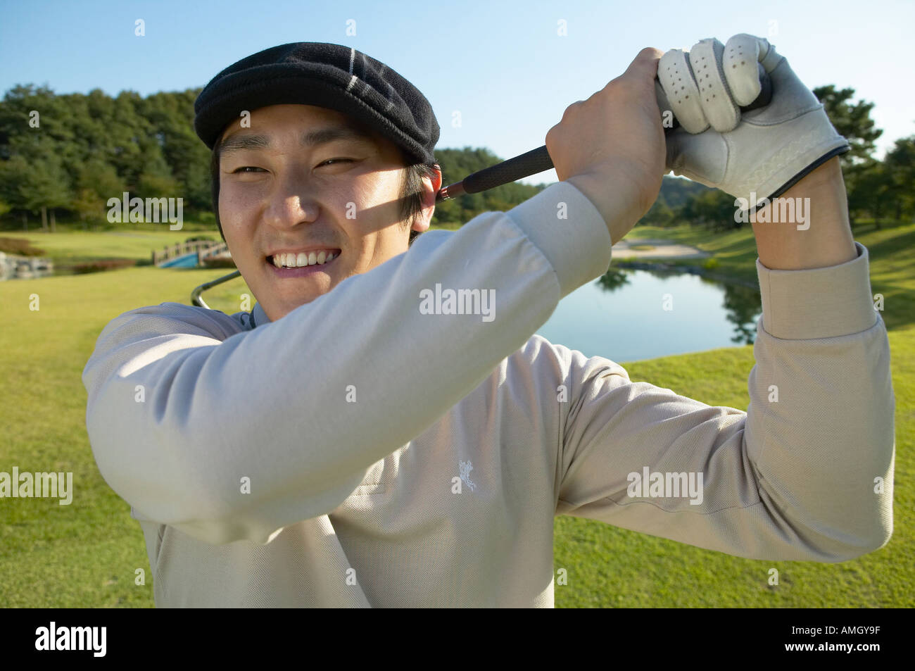 Asian man playing golf hi-res stock photography and images - Alamy