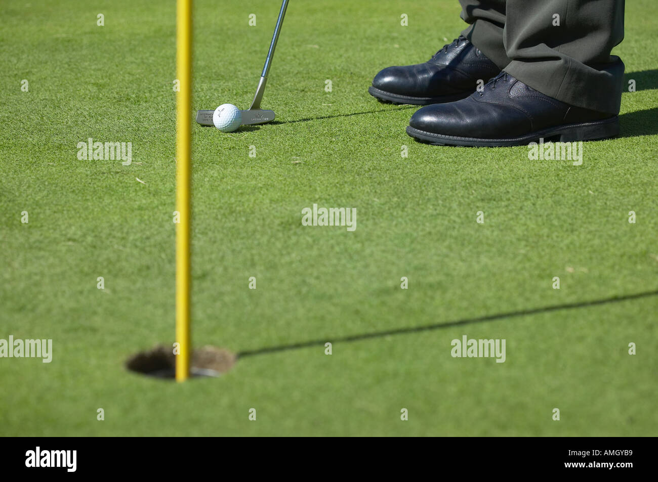 A person playing golf Stock Photo - Alamy