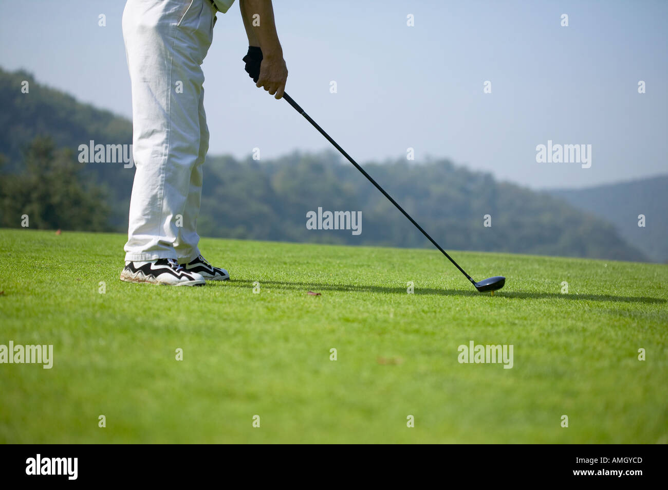 A person playing golf Stock Photo - Alamy