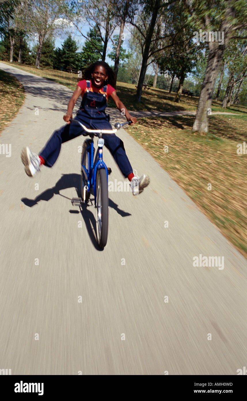 African american teen girl riding bike hi-res stock photography and ...