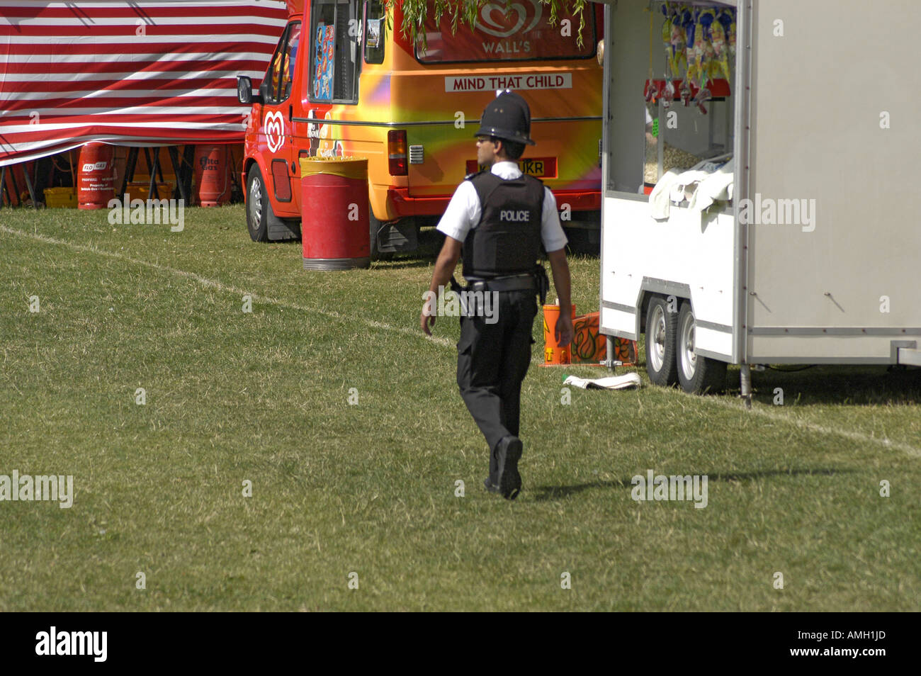 Police officer at local event Stock Photo - Alamy