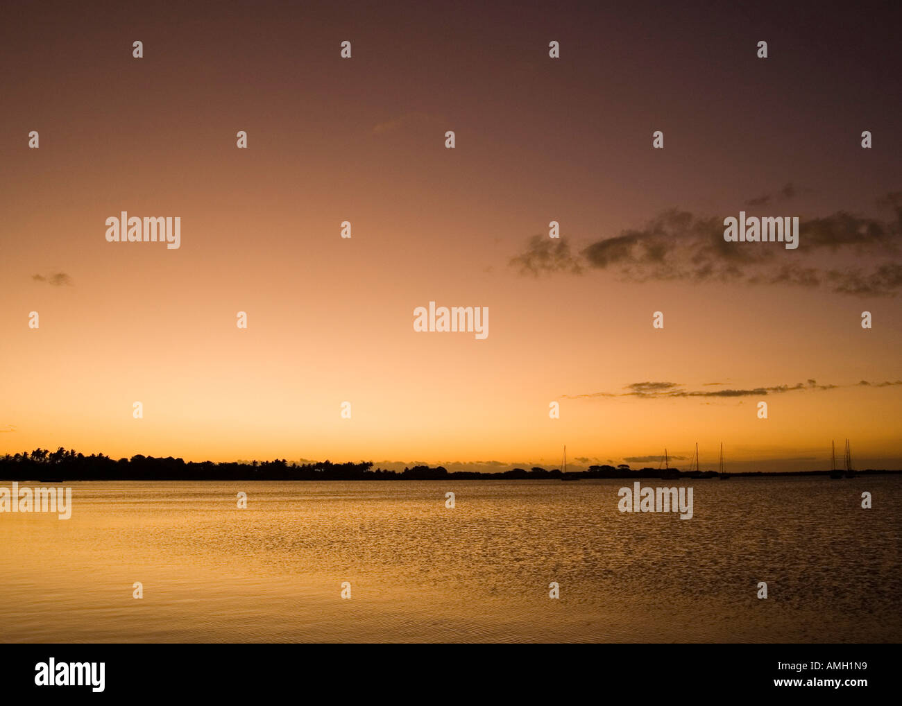 Beautiful pink sunset over ocean hi-res stock photography and images ...