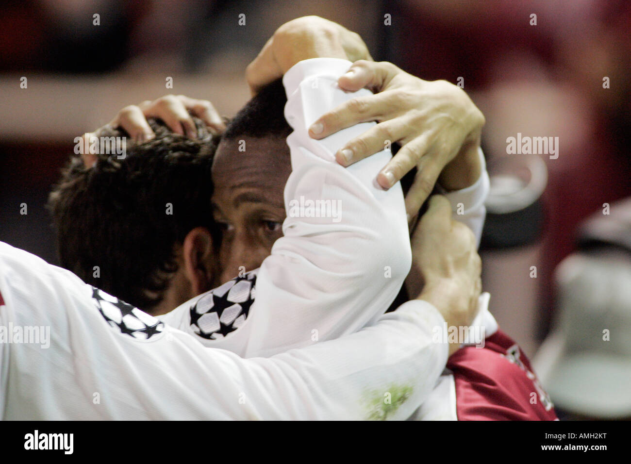 Heads and arms of Sevilla FC players hugging after a goal scoring Stock ...