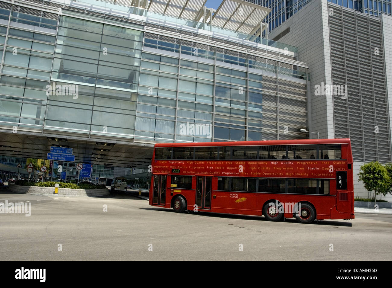 Double decker red bus travelling on a road in Hong Kong, China Stock ...