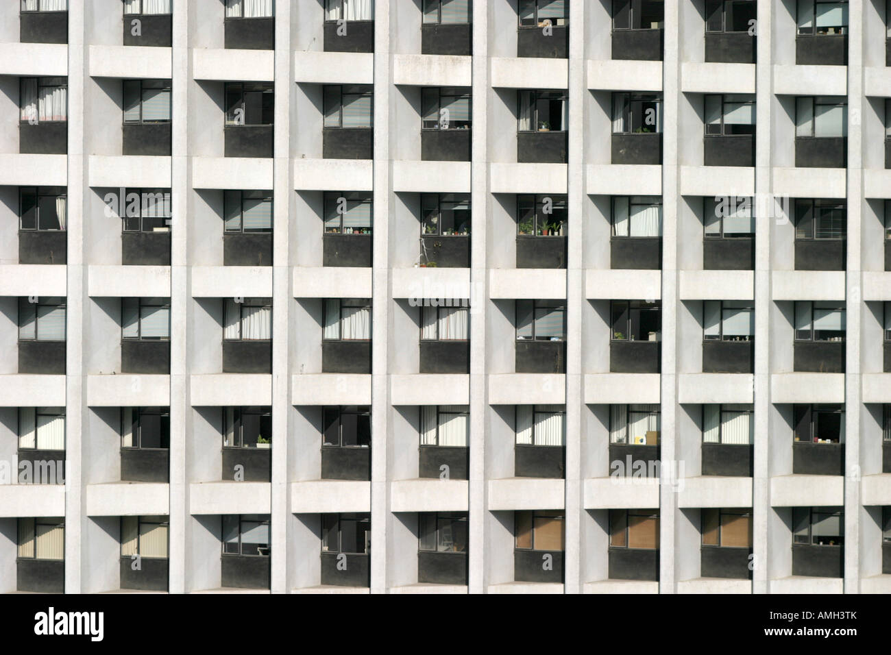 Repetitive office building windows in Hong Kong Stock Photo - Alamy