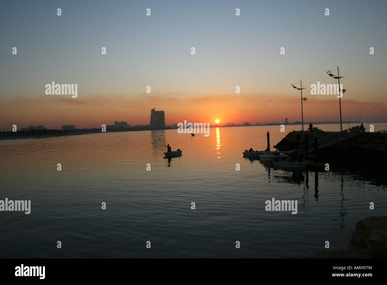 sunset at arabian gulf sea in kuwait Stock Photo - Alamy