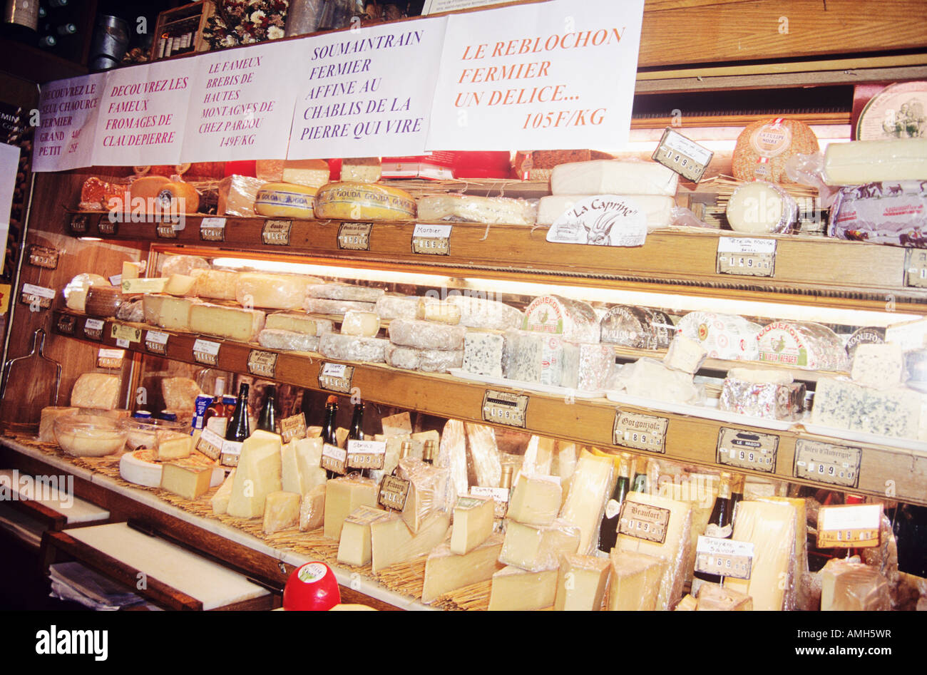 Cheeses on display in a delicatessen, Paris, France Stock Photo - Alamy