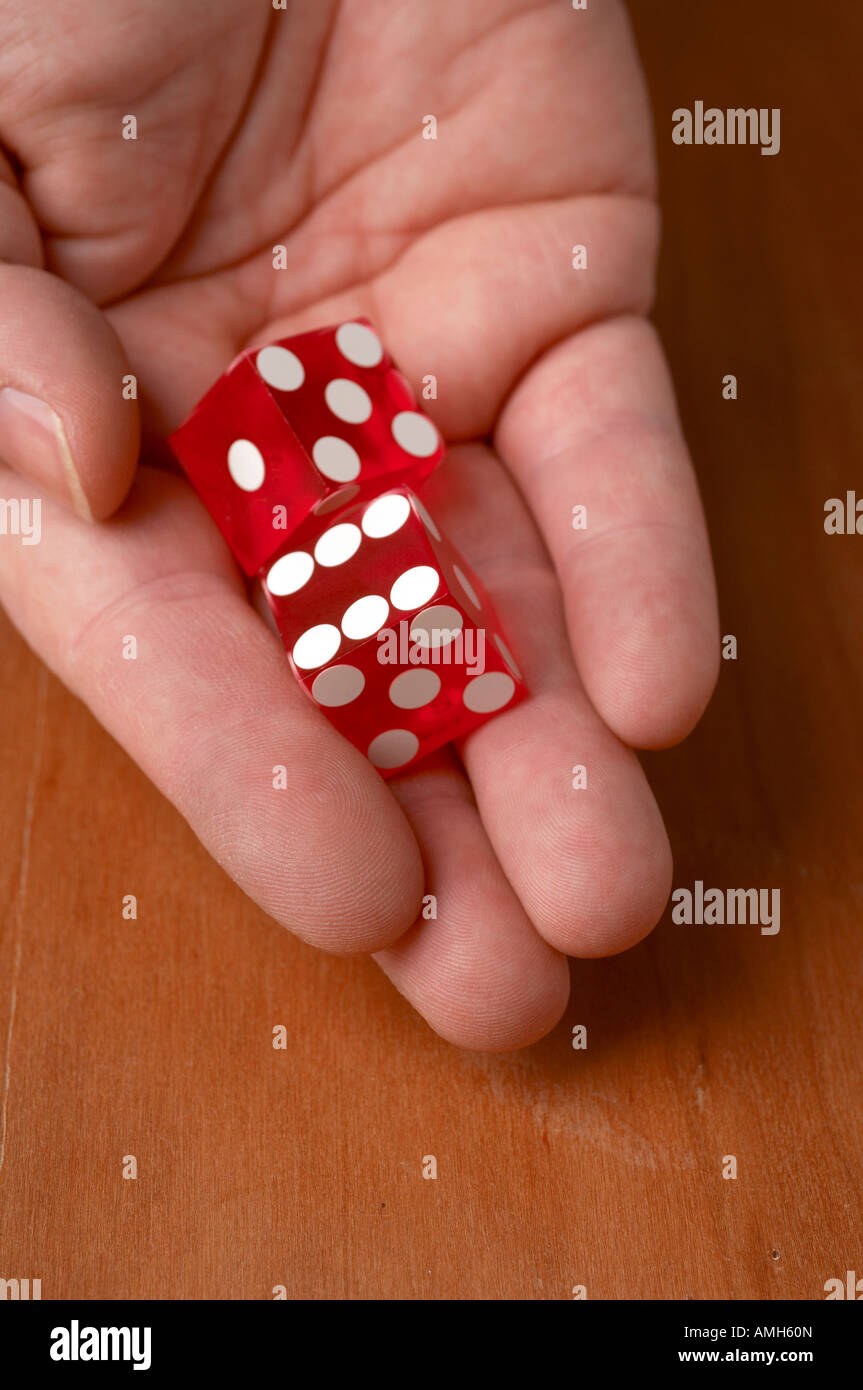 Hand rolling die dice hi-res stock photography and images - Alamy