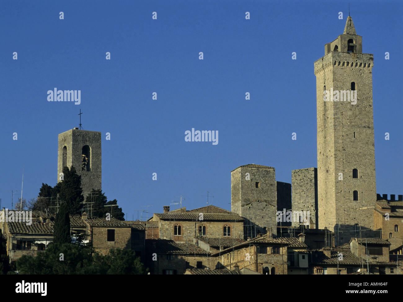 Medieval towers in the townscape at sunset, San Gimignano, Italy Stock ...