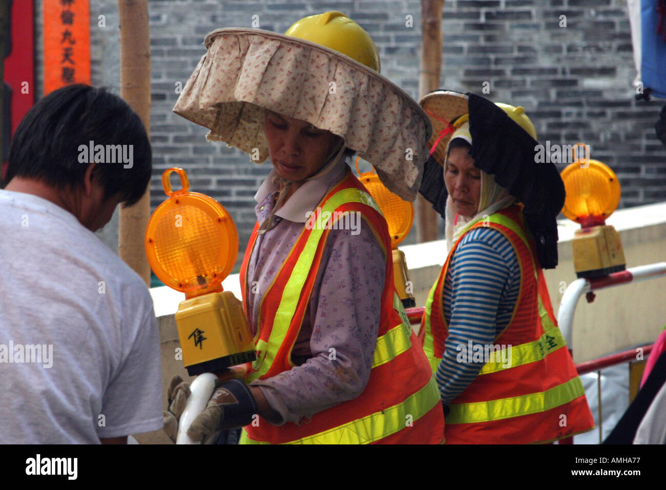 Female street workers in Tai Po Hong Kong Stock Photo - Alamy