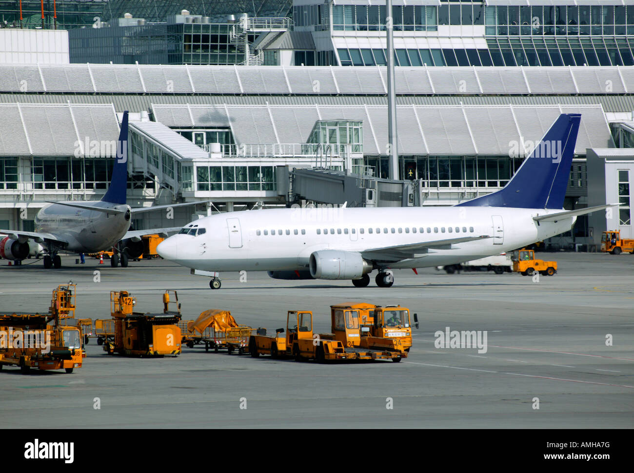 airport munich with a parking airplane Stock Photo - Alamy