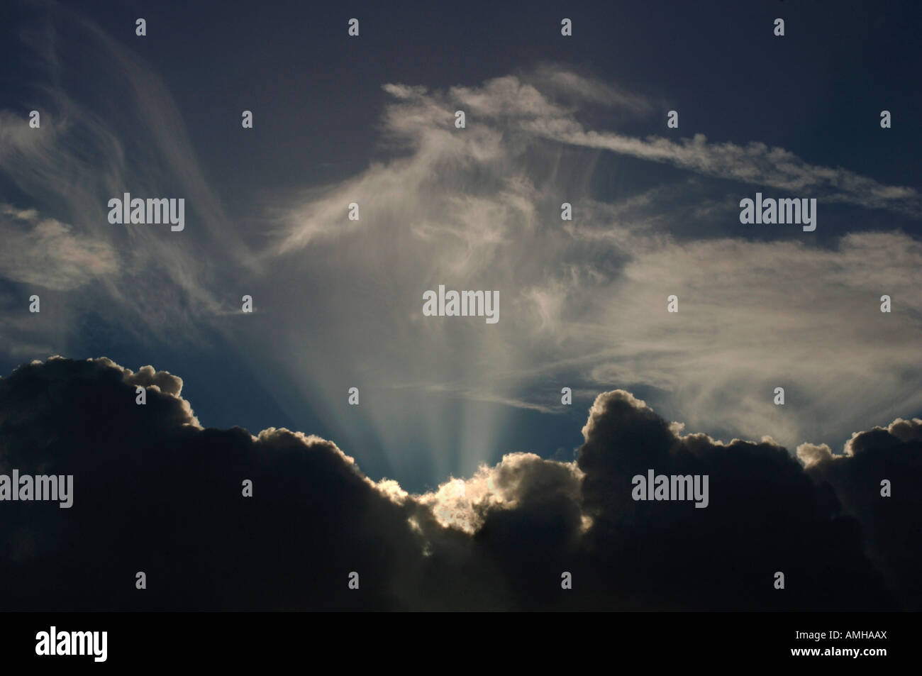 Blue Sky,Sunbeams & Clouds Stock Photo - Alamy