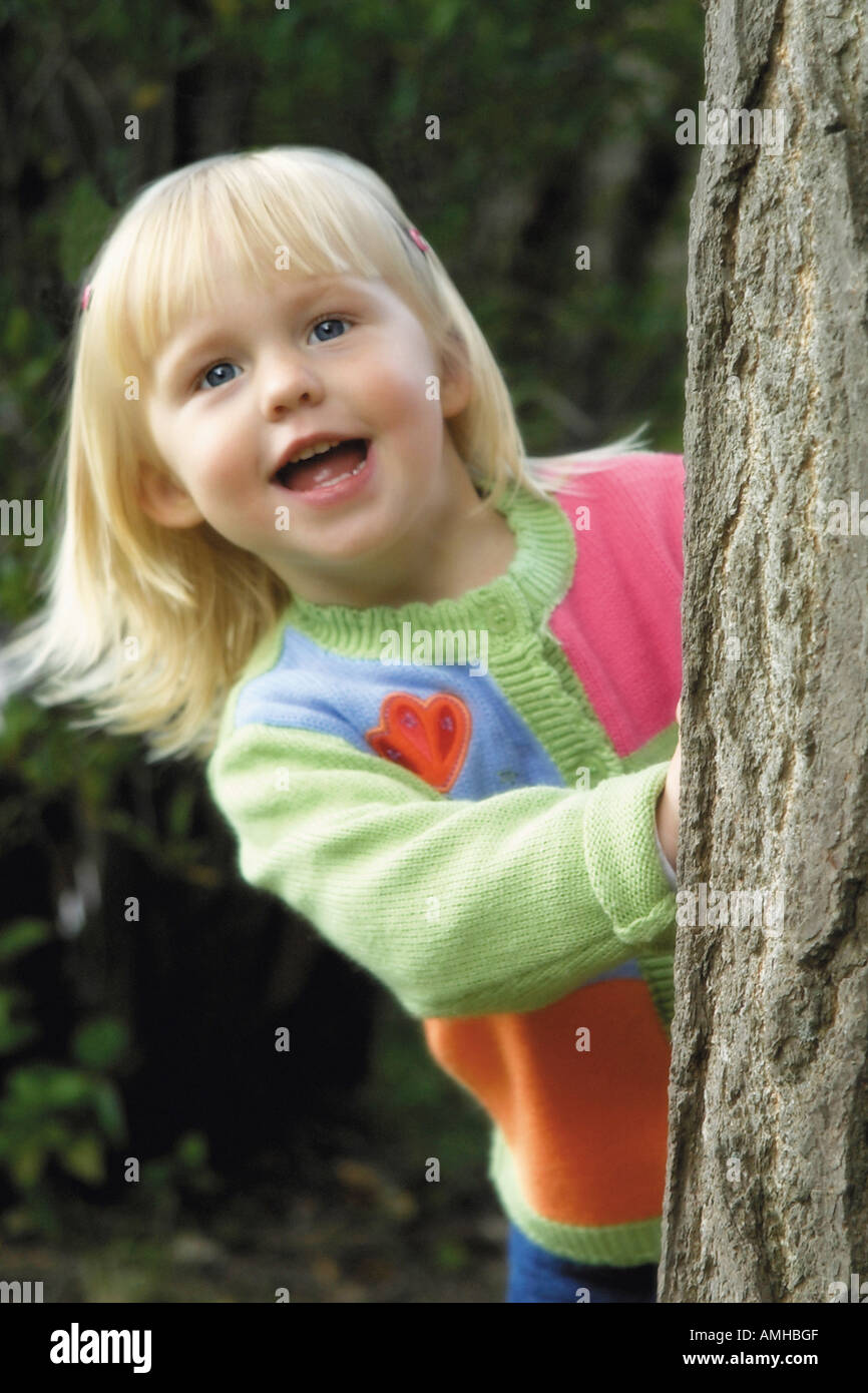 Child Hiding Behind Tree High Resolution Stock Photography and Images ...