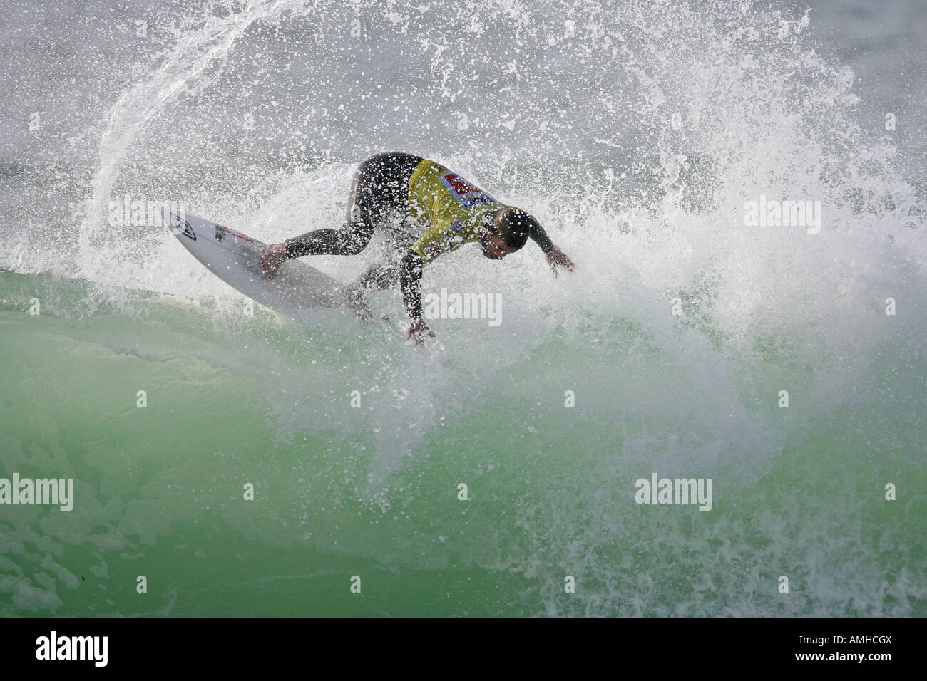 A Surfer rides a Wave Stock Photo - Alamy