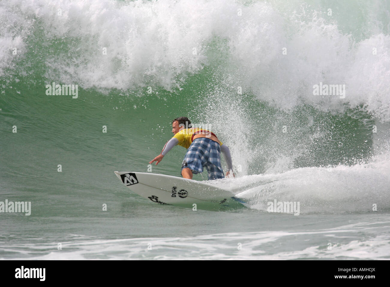 A Surfer rides a Wave Stock Photo - Alamy