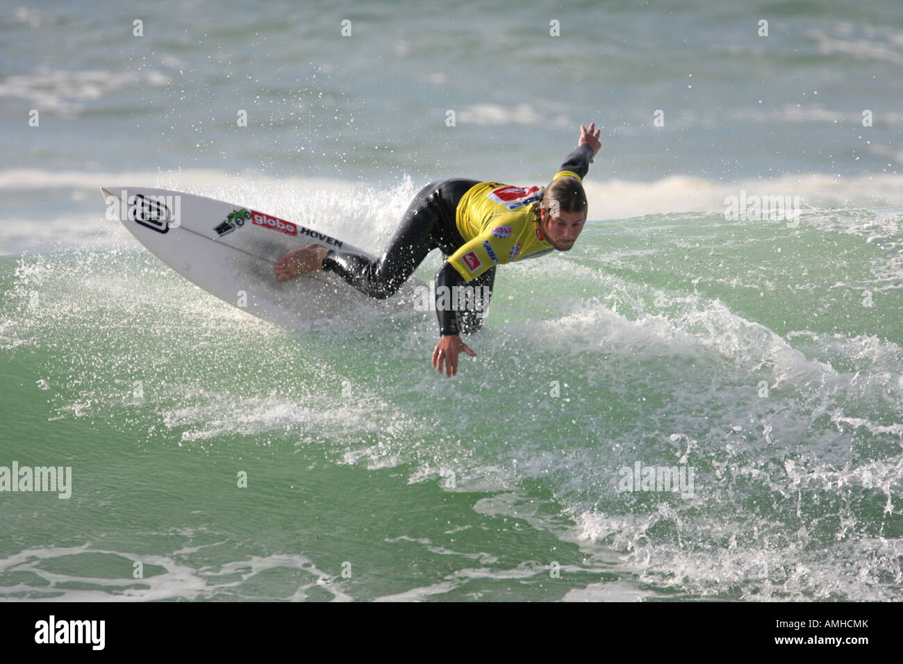 A Surfer rides a Wave Stock Photo - Alamy