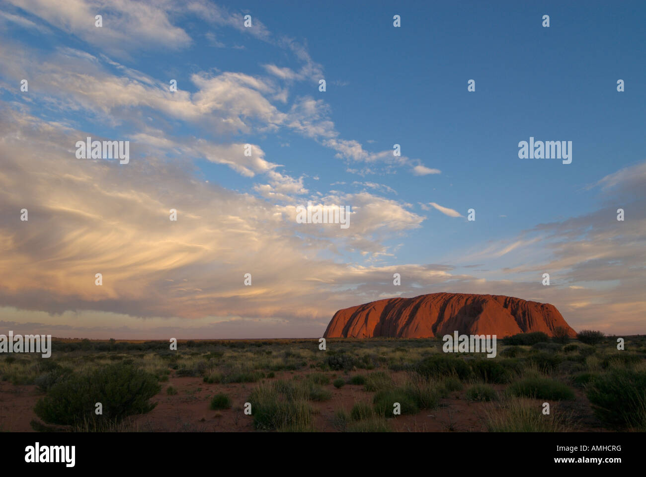 Uluru at sunset Stock Photo - Alamy