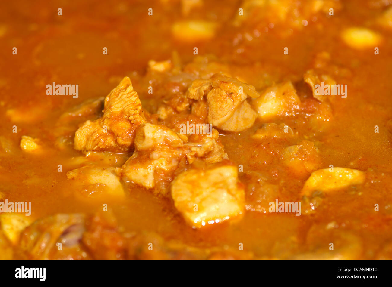 Chicken Curry cooking Stock Photo - Alamy