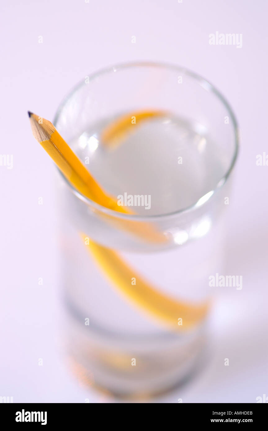 Demonstration of water refraction using a pencil and a glass of water ...