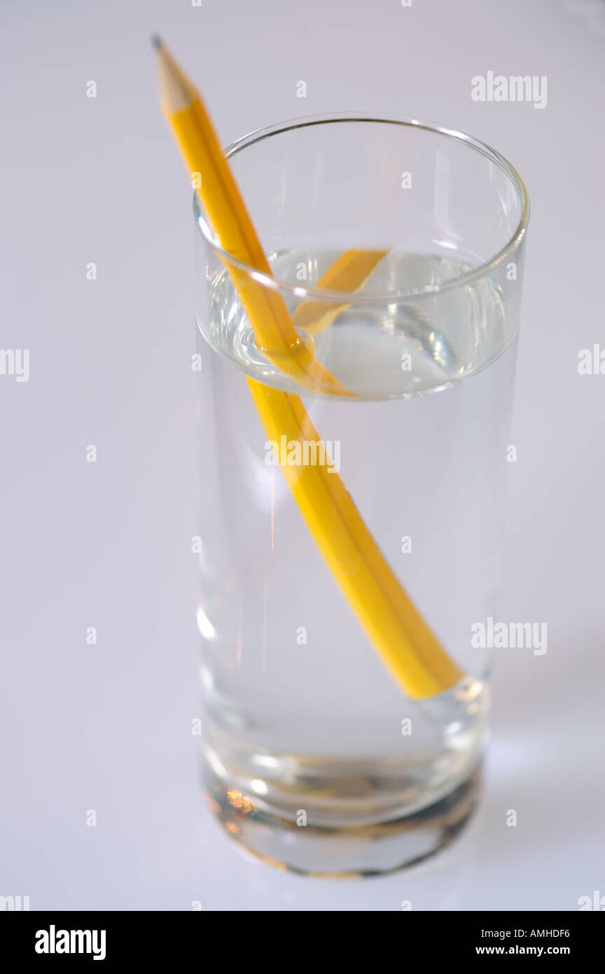 Demonstration of water refraction using a pencil and a glass of water ...