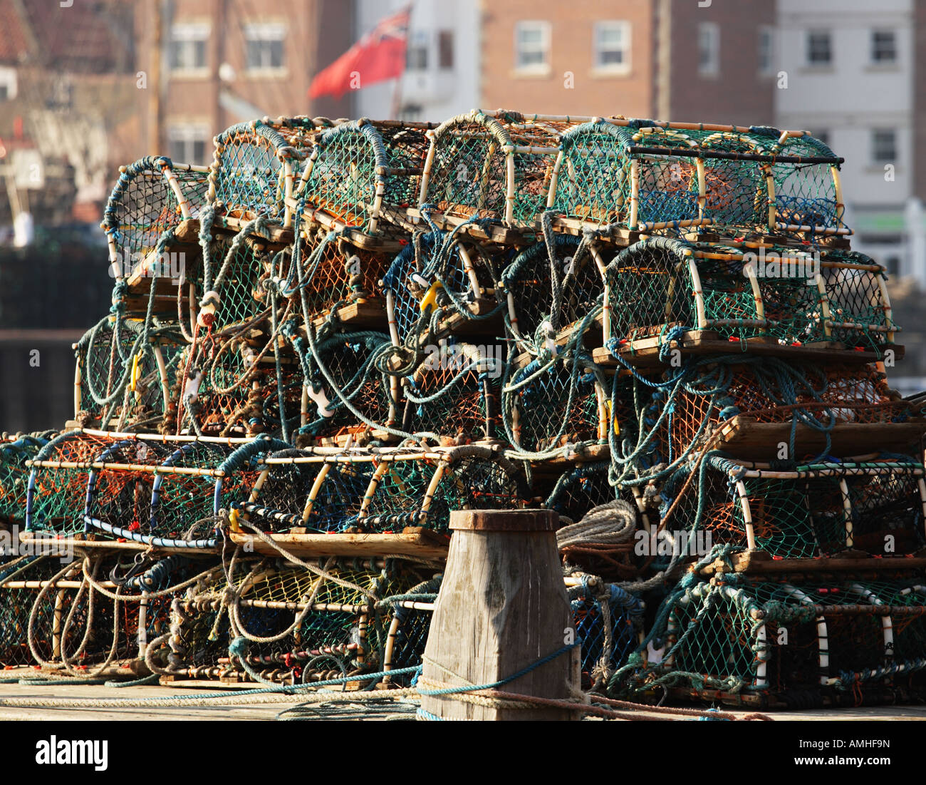 Lobster pots piled up on the harbour at Whitby Yorkshire UK Stock Photo ...