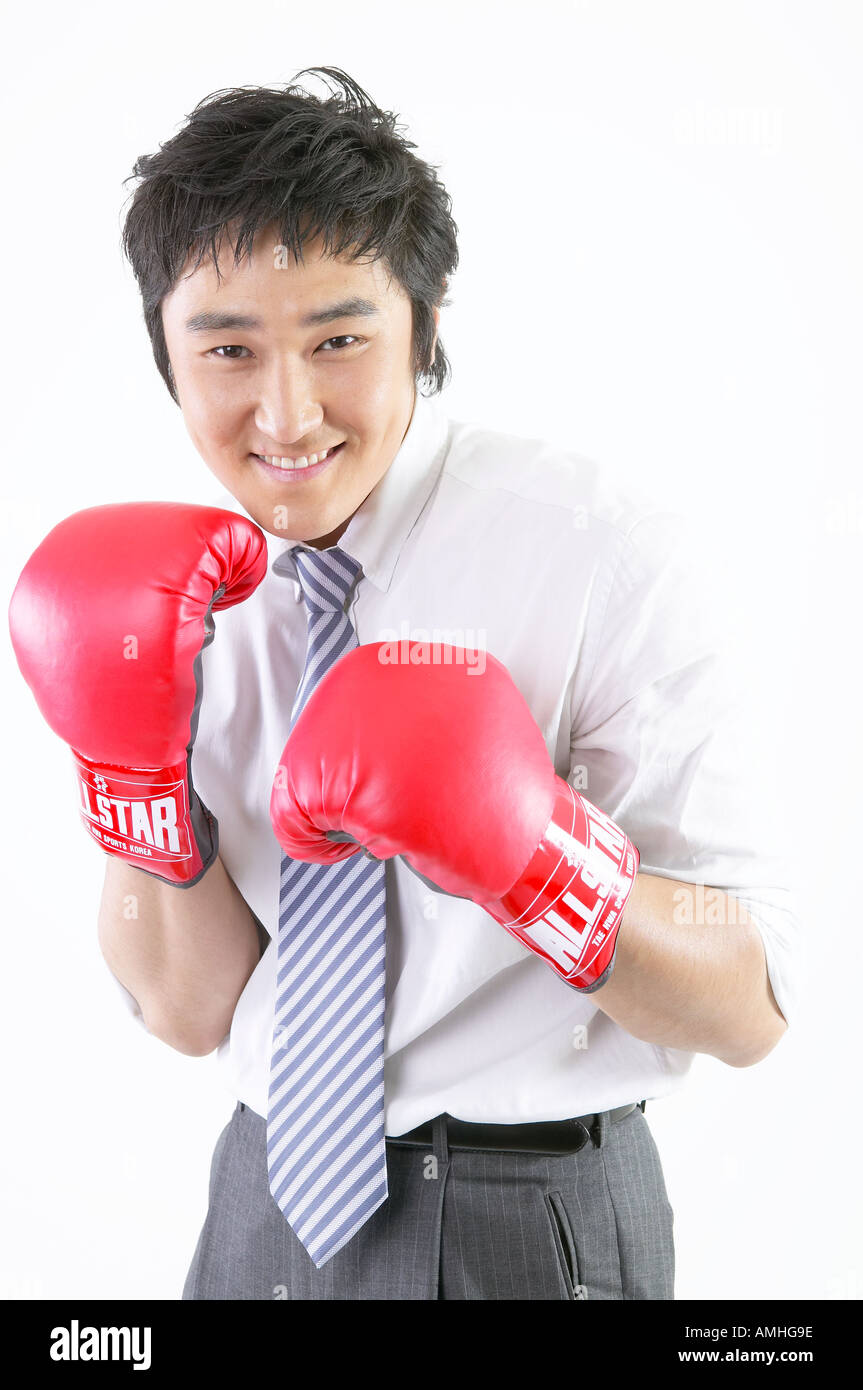 Man in suit wearing boxing hi-res stock photography and images - Alamy