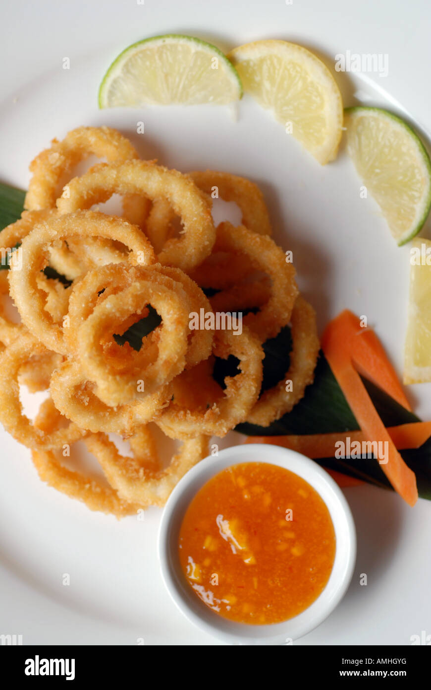 Asian style squid Calamari with a Mango dipping sauce Stock Photo - Alamy