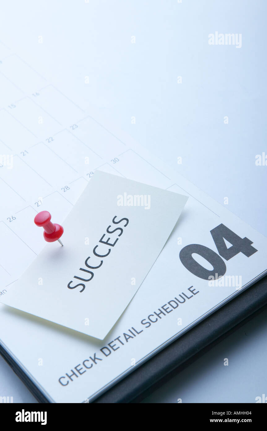 A success note pinned on a calendar Stock Photo - Alamy