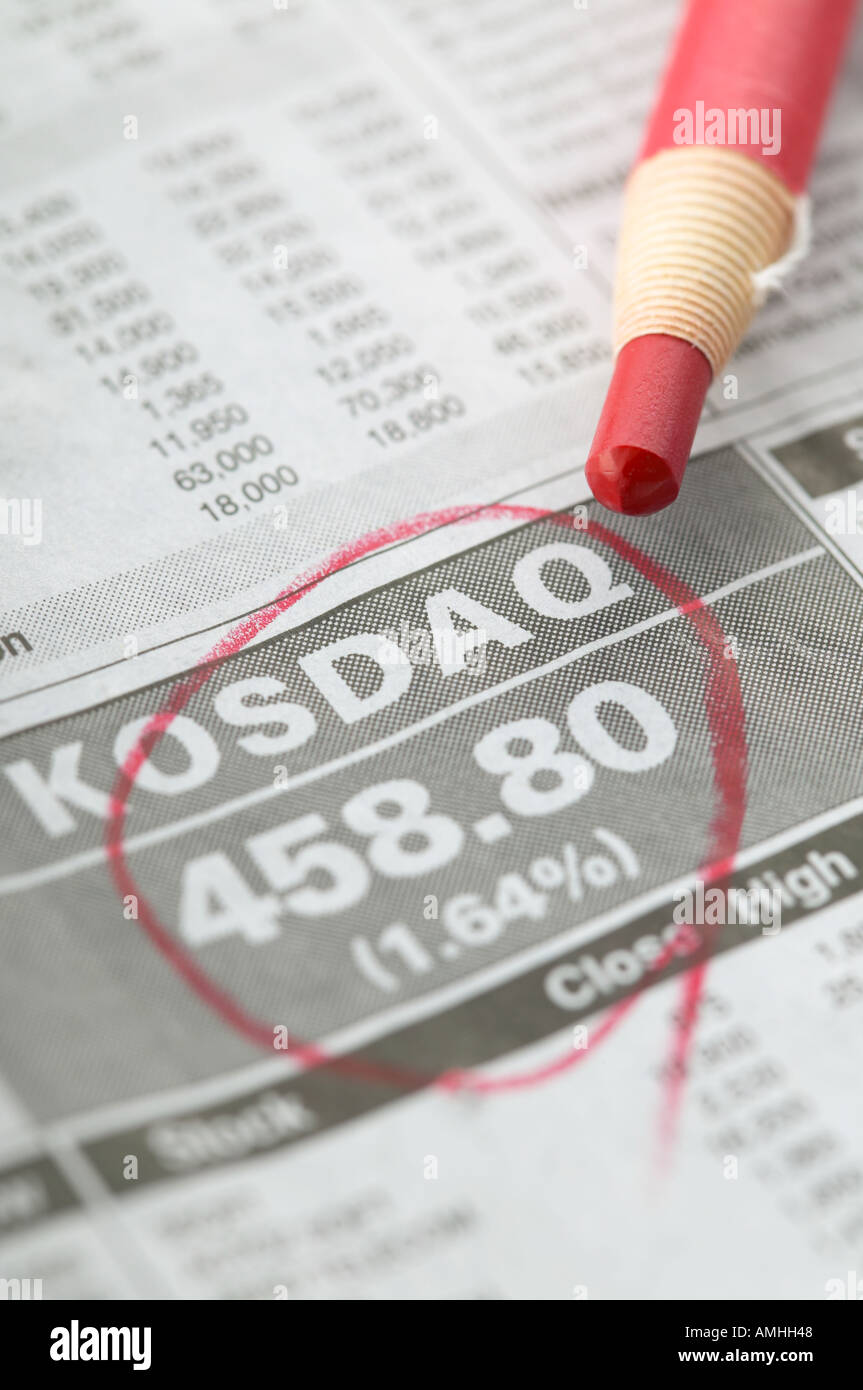 a section of a newspaper highlighted in the red circle Stock Photo - Alamy