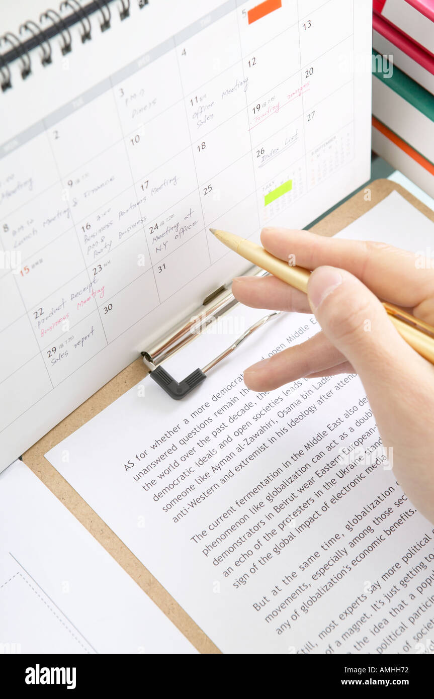 A man marking on the calendar Stock Photo - Alamy