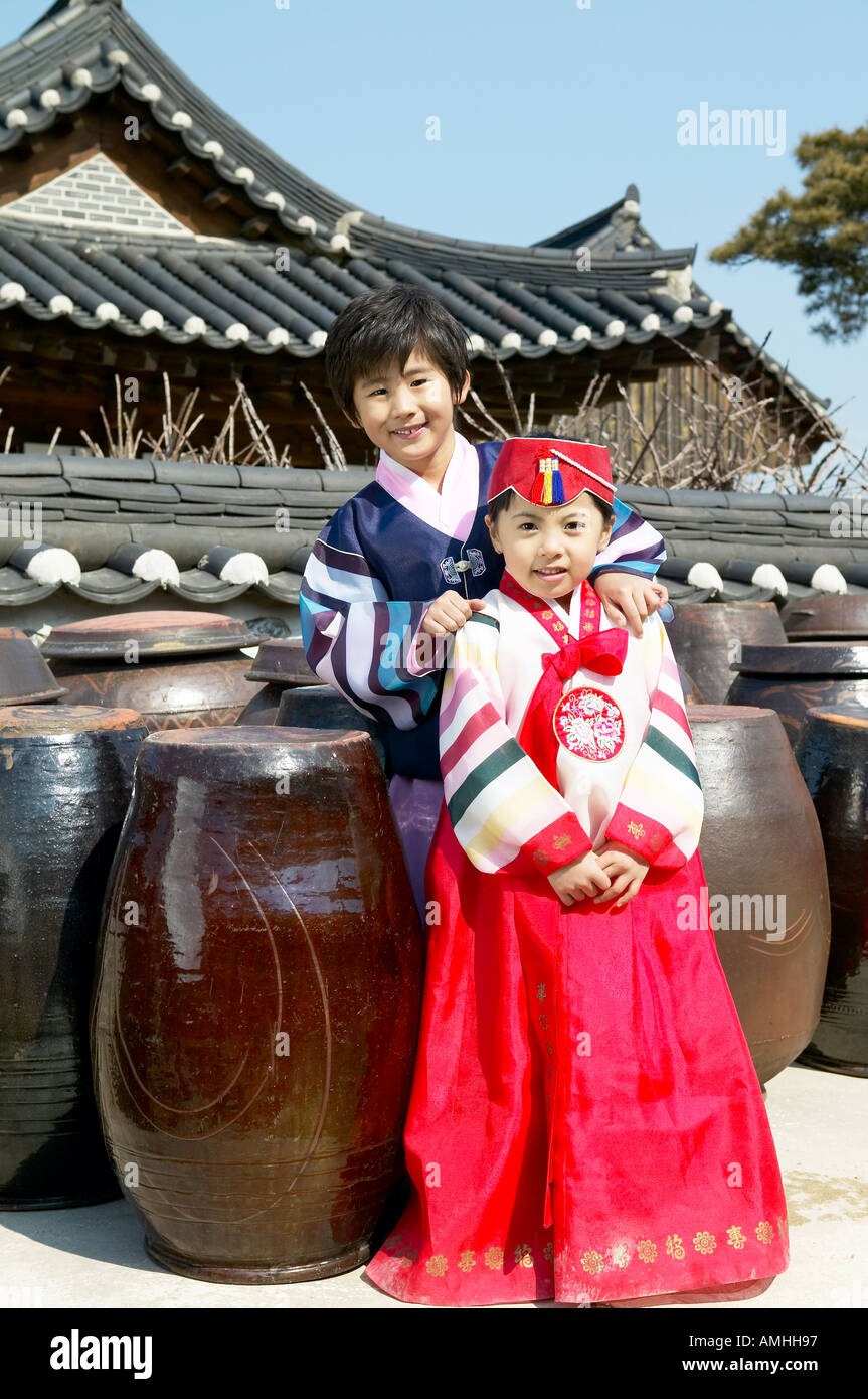Children in Hanbok by the crocks Stock Photo - Alamy
