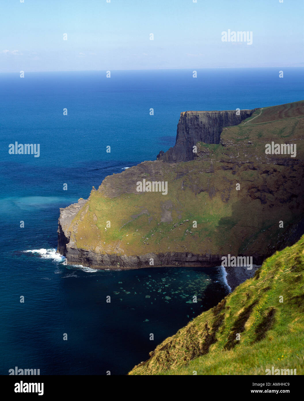 steep cliffs form the wall s of the atlantic waves/breakers off the ...