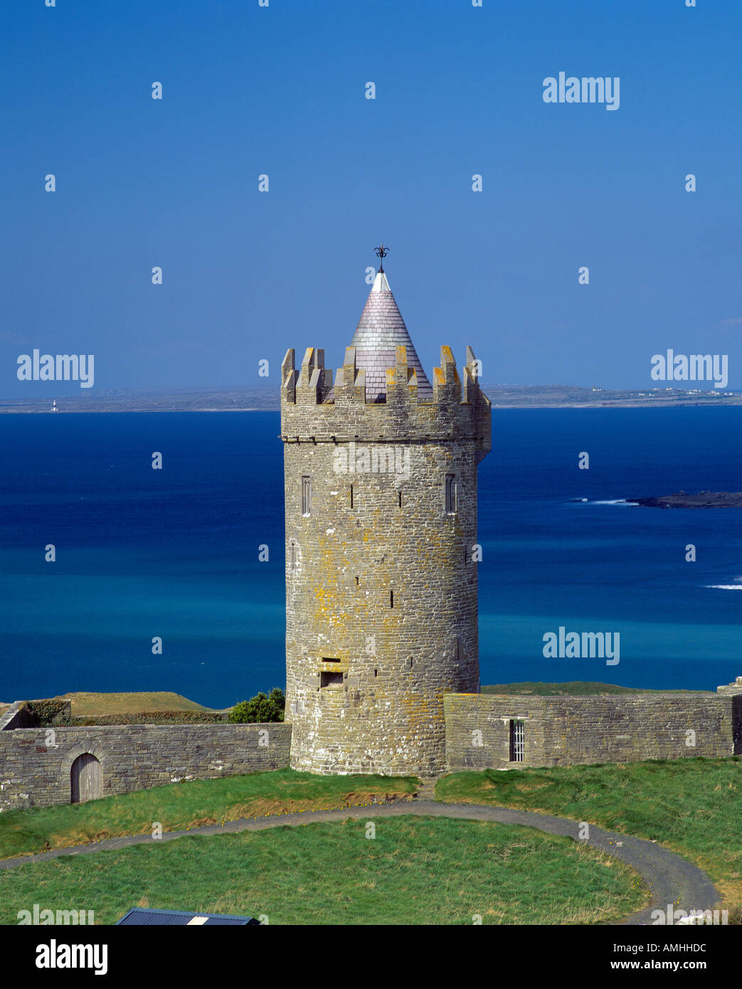 large stone built castle overlooking the wide atlantic ocean on ...