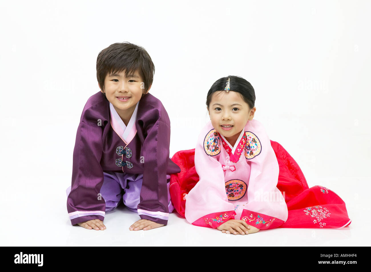 Children in Hanbok greet in Korean way Stock Photo - Alamy