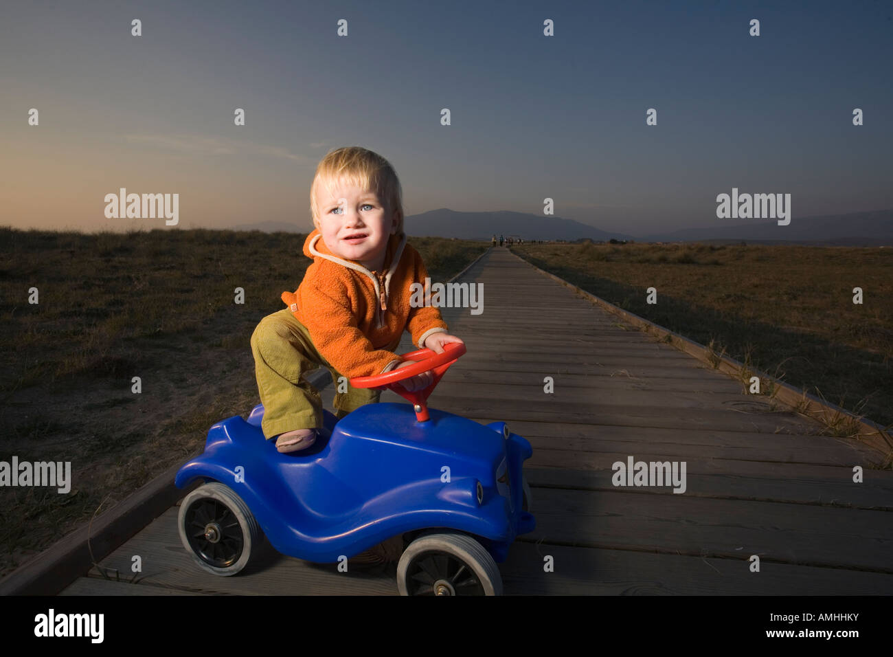 child with her toy car Stock Photo - Alamy