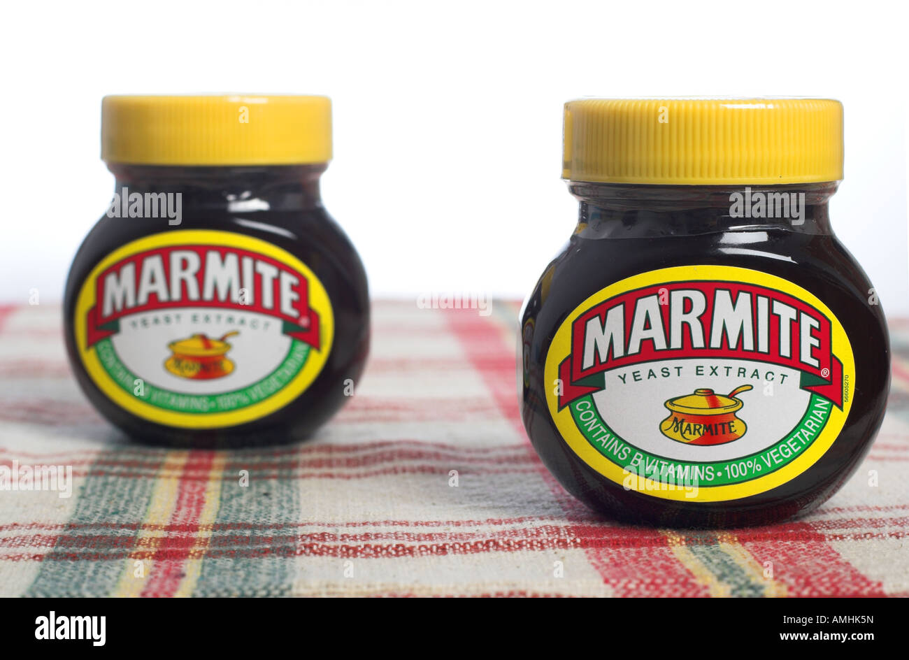 two jars of Marmite yeast extract on table for editorial use only Stock ...