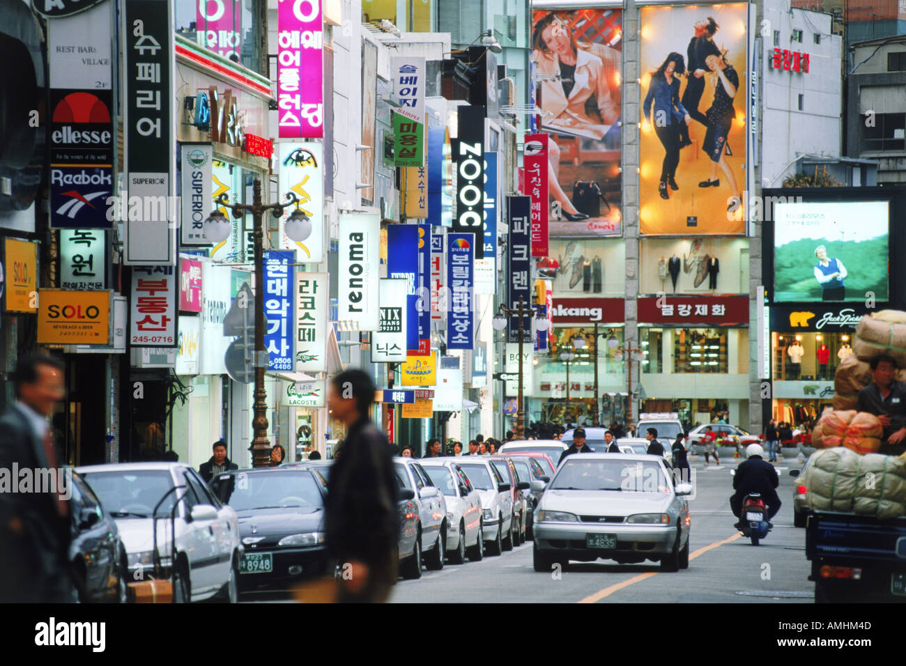 Shops and traffic on busy street in Pusan South Korea Stock Photo - Alamy