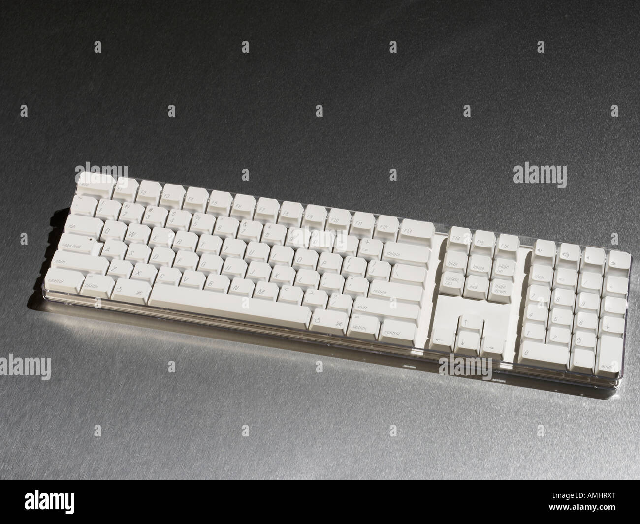 Desk top computer keyboard on brushed aluminum Stock Photo - Alamy