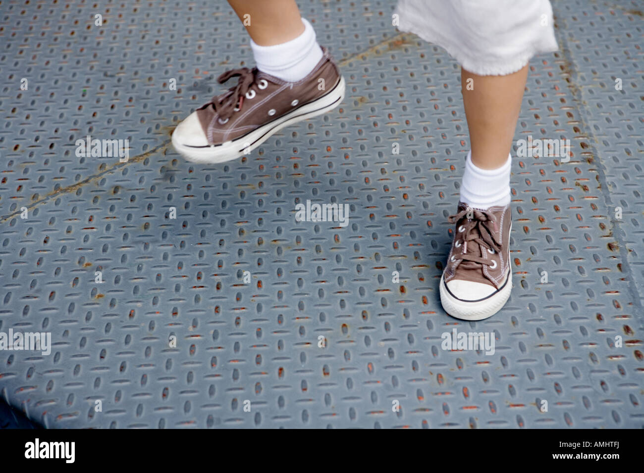 Child stomping feet hi-res stock photography and images - Alamy