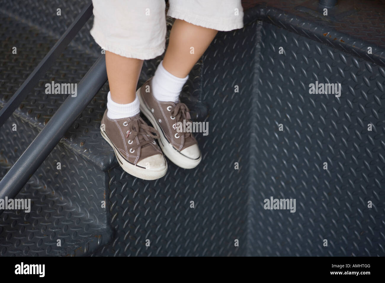 Children kids feet shoes standing hi-res stock photography and images ...