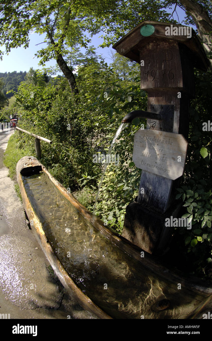 drinking drink well trough water Stock Photo - Alamy