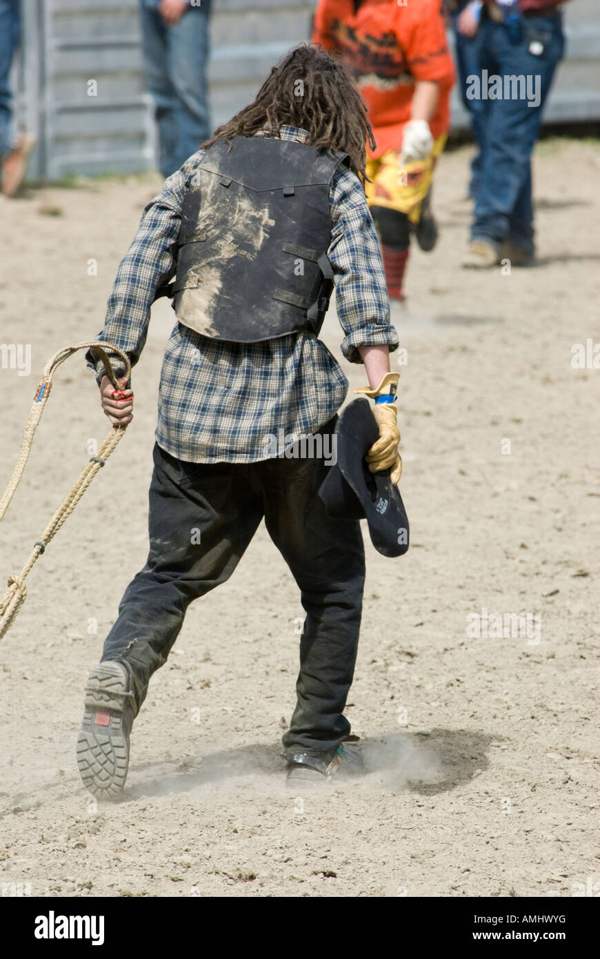 Rodeo bull rider walks off after falling from his bull, Methven Rodeo ...