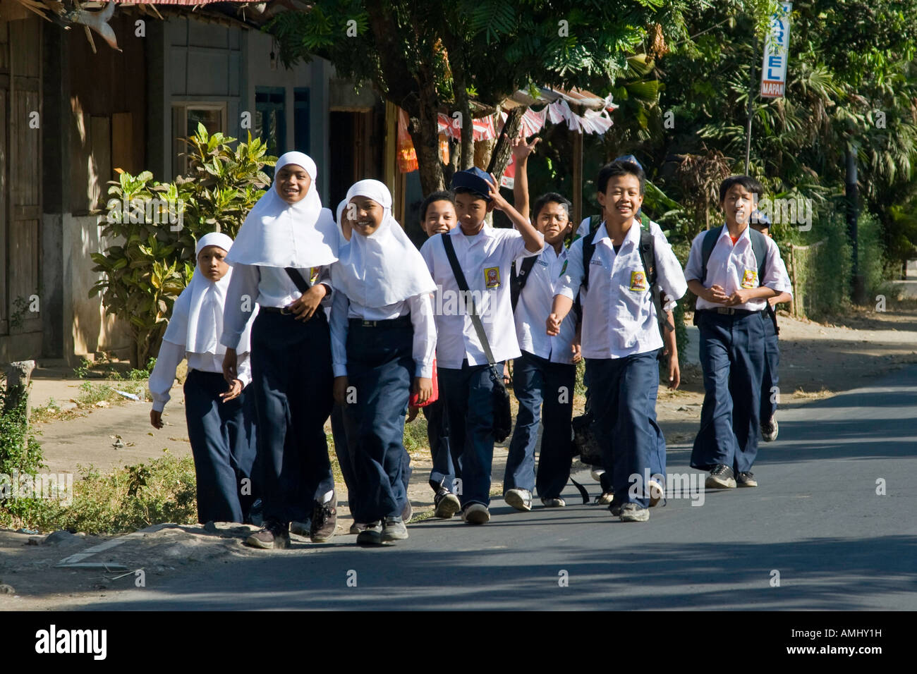 Muslim Children wearing School Uniforms walk to School Yogyakarta ...